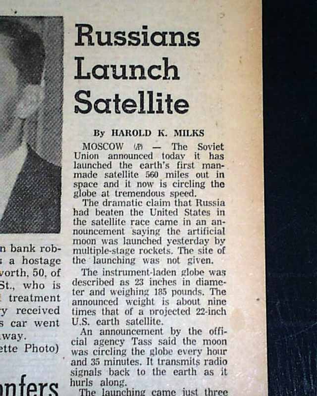 Sputnik begins the space race... - RareNewspapers.com